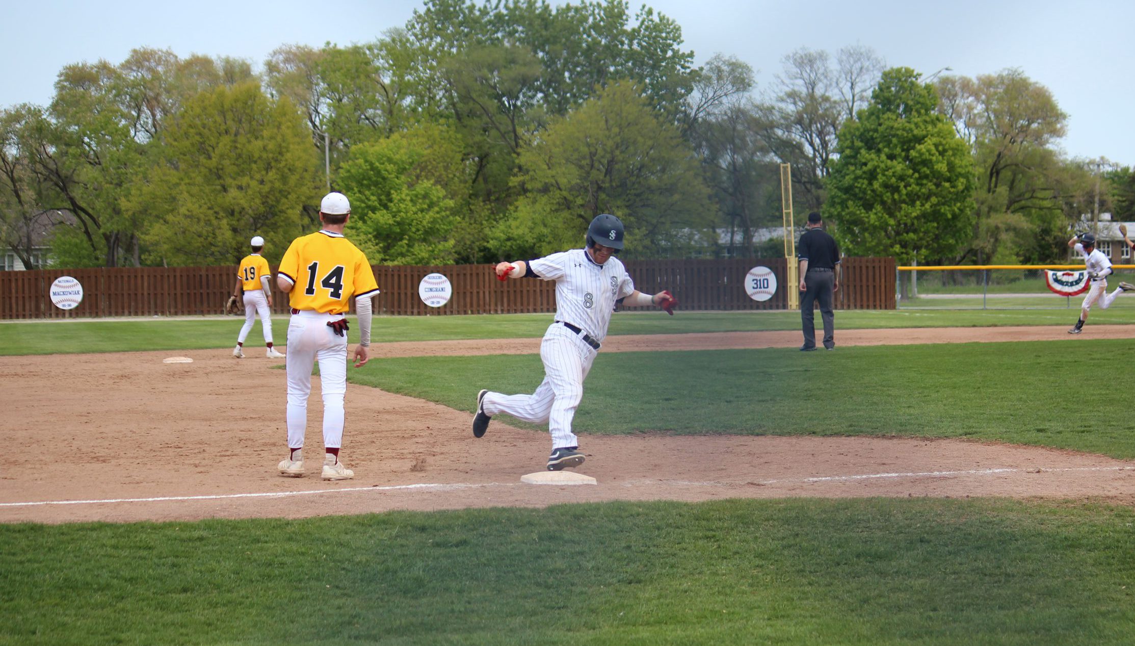Logan rounding 3rd base | South Suburban College